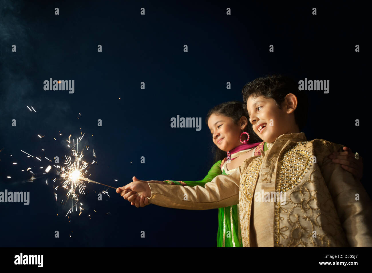 Children burning fire crackers on Diwali Stock Photo - Alamy