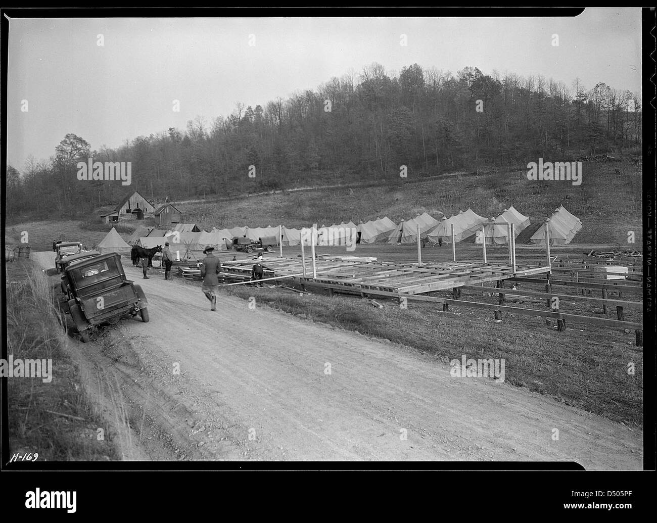 A 1933 photograph taken by Lewis Hine showing the Civilian Conservation ...