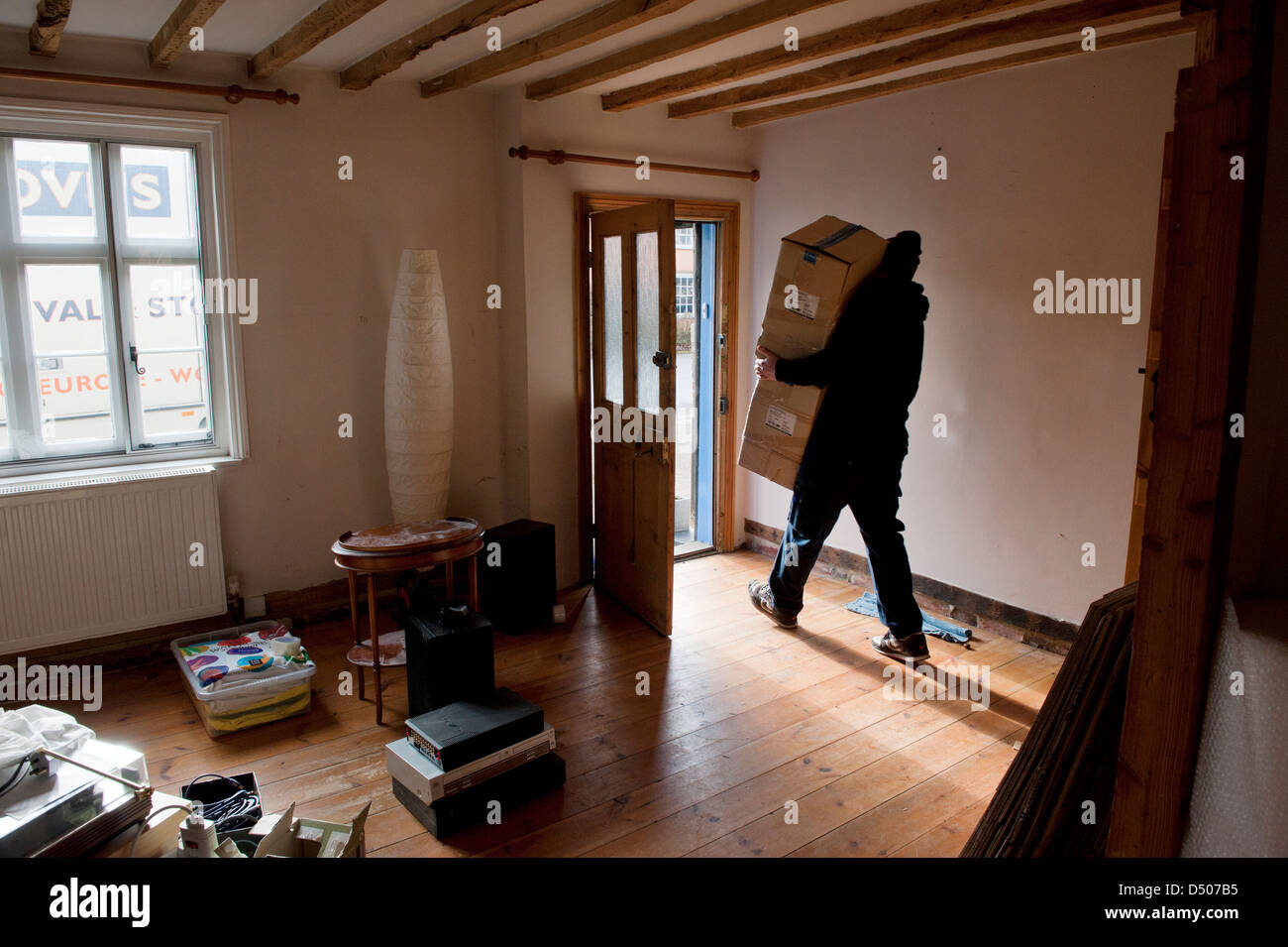 Moving Home. Removal men move contents of photographers house, Stoke by ...