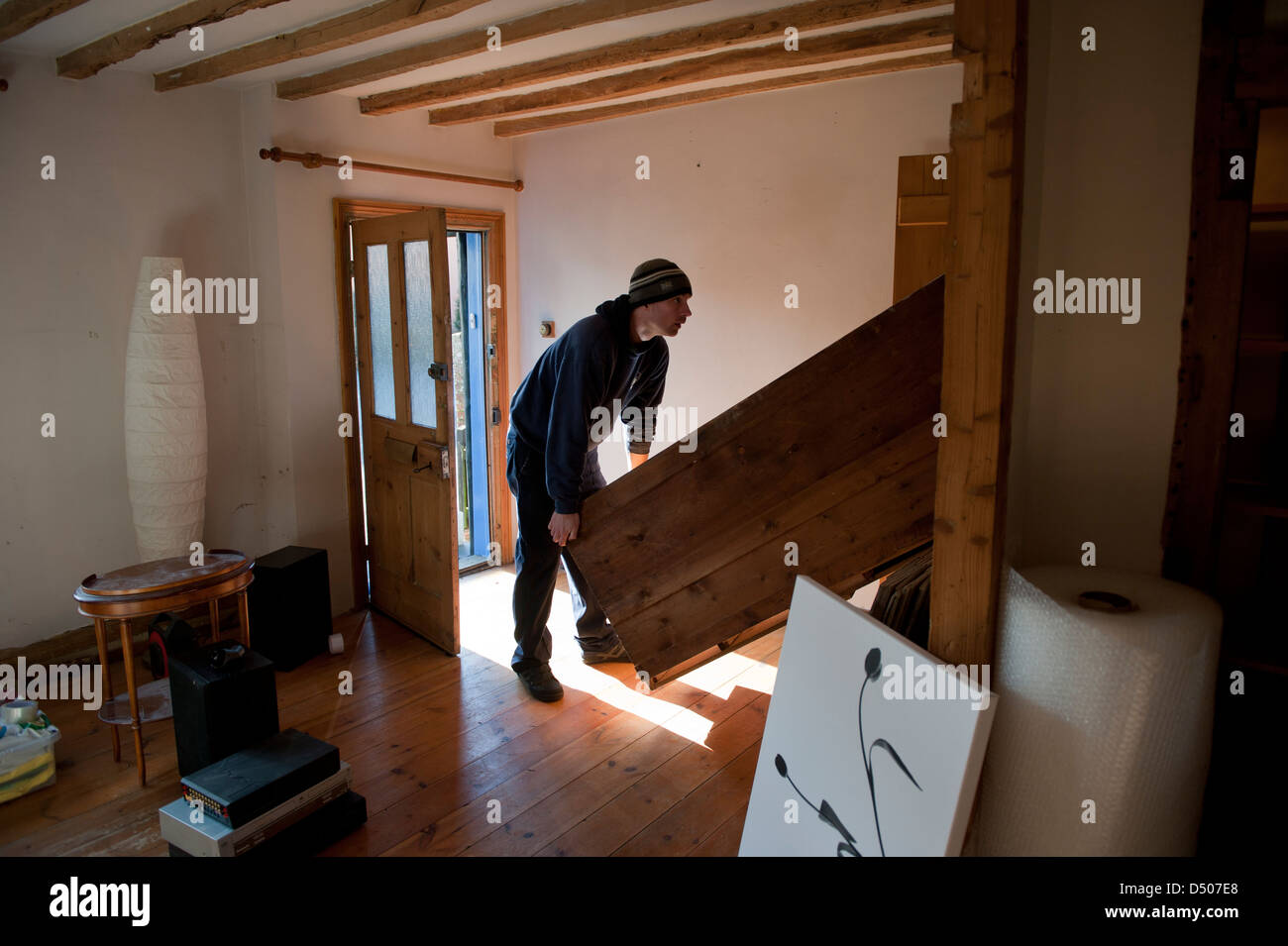 Moving Home. Removal men move contents of photographers house, Stoke by ...