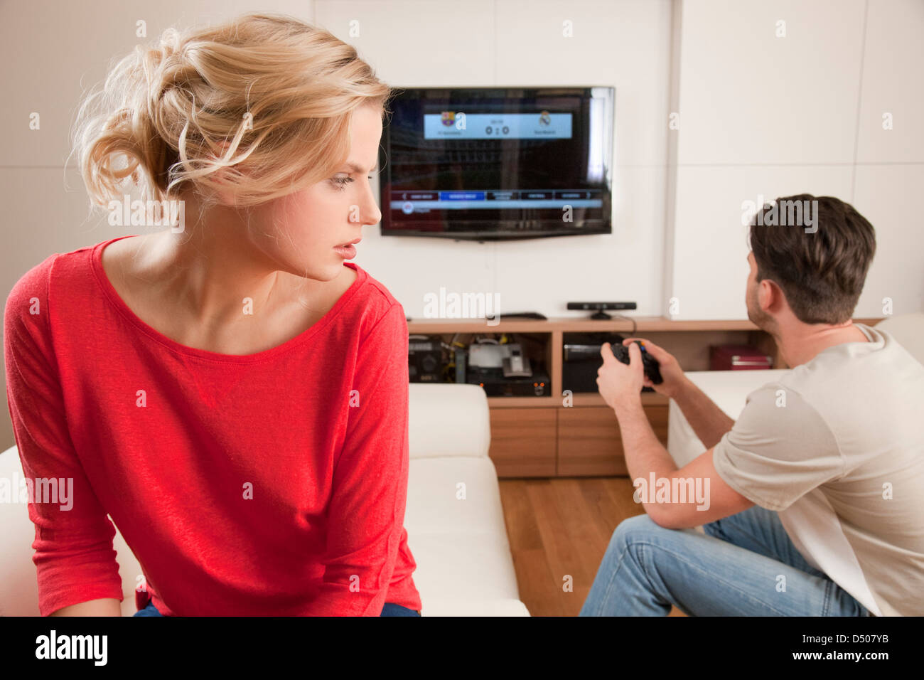 Man playing console game Stock Photo - Alamy