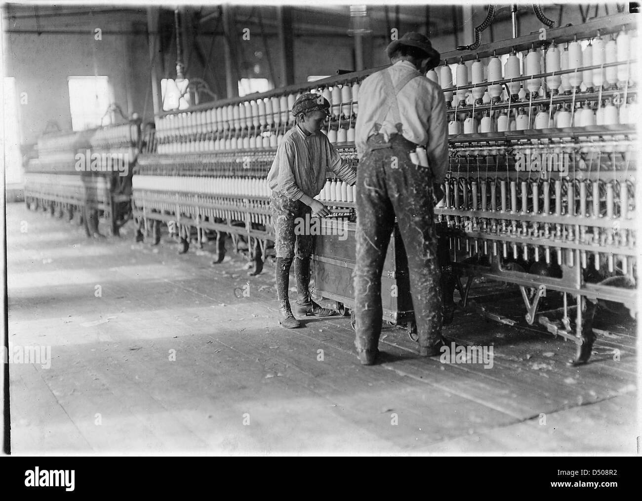 A photograph from November 1908 showing a doffer at Vivian Cotton Mills ...