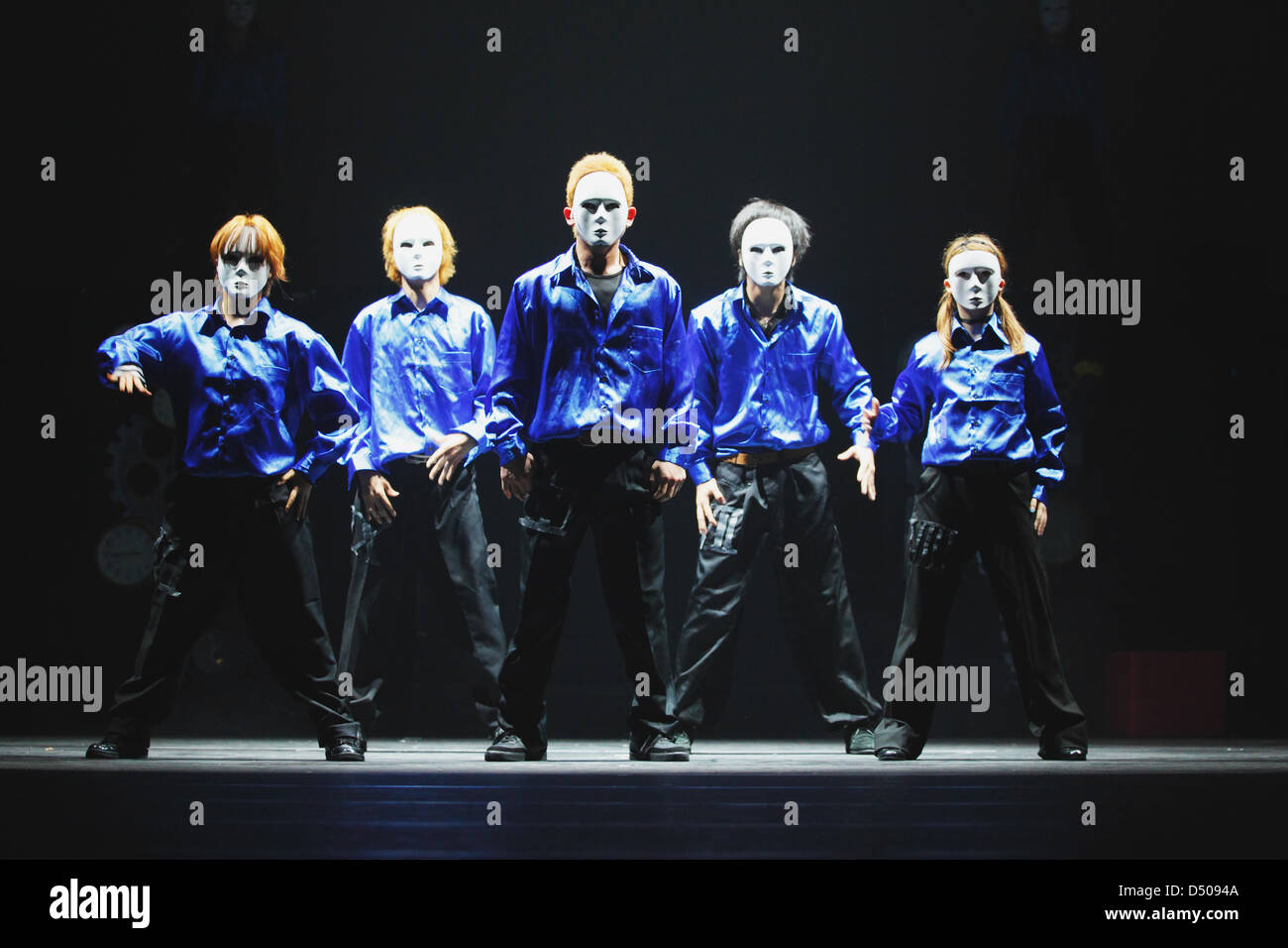 Group of dancers wearing masks Stock Photo - Alamy