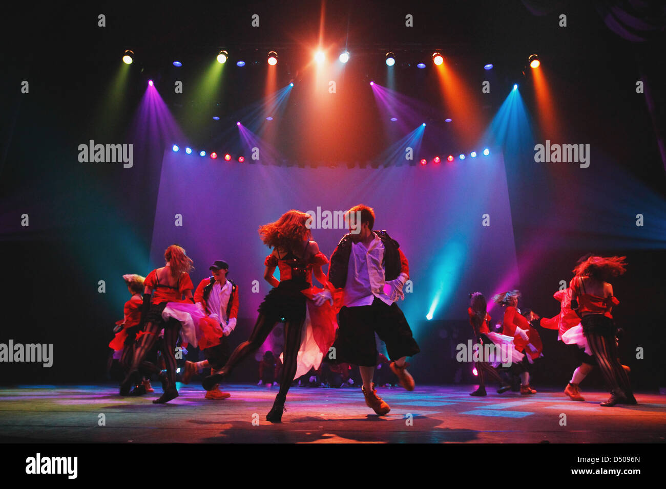 Group of dancers performing Stock Photo - Alamy