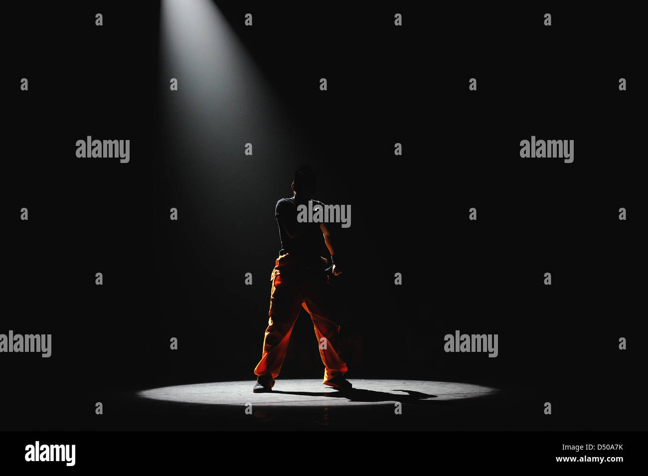 Dancer in the spotlight Stock Photo - Alamy