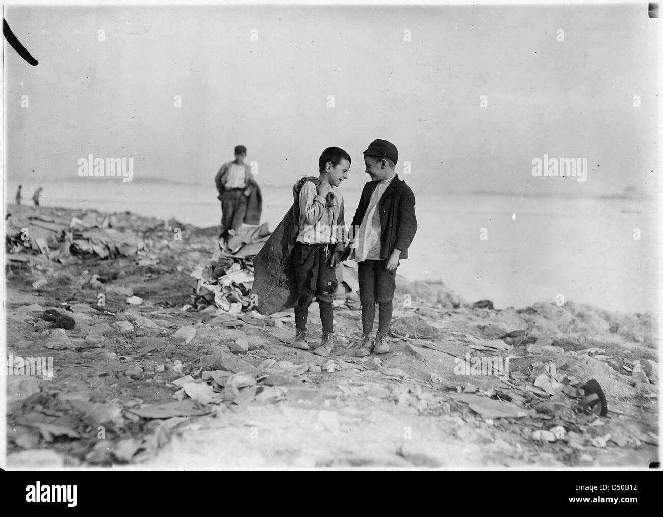 Children scavenging in garbage hi-res stock photography and images - Alamy