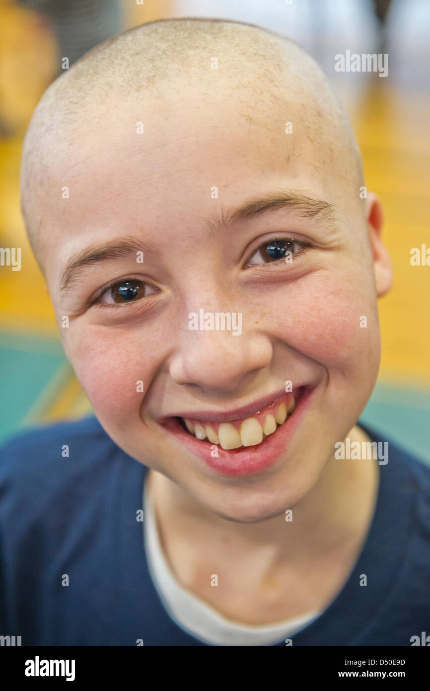 Boy shaved head hair cut hi-res stock photography and images - Alamy