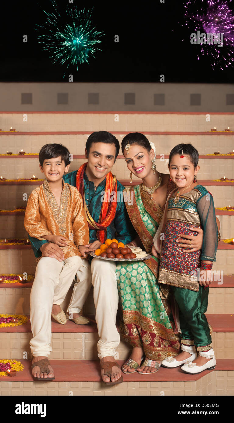 Family celebrating Diwali Stock Photo - Alamy