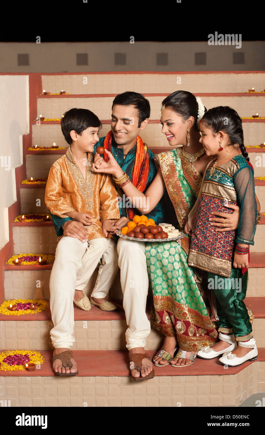 Family celebrating Diwali Stock Photo - Alamy