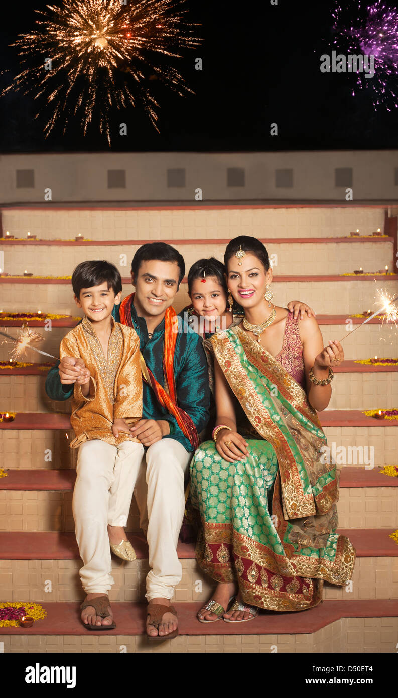 Children burning fire crackers on hi-res stock photography and images ...