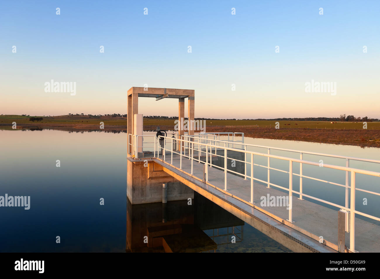 Outlet tower in a small irrigation dam, part of the Alqueva Irrigation ...