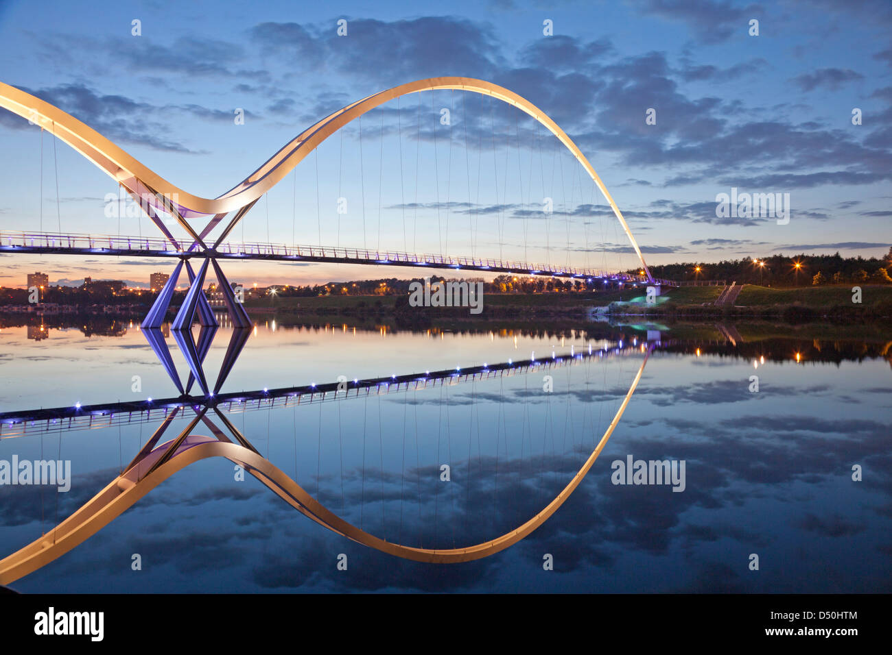 The Infinity bridge, Stockton-on-Tees, reflected in the river Tees at ...