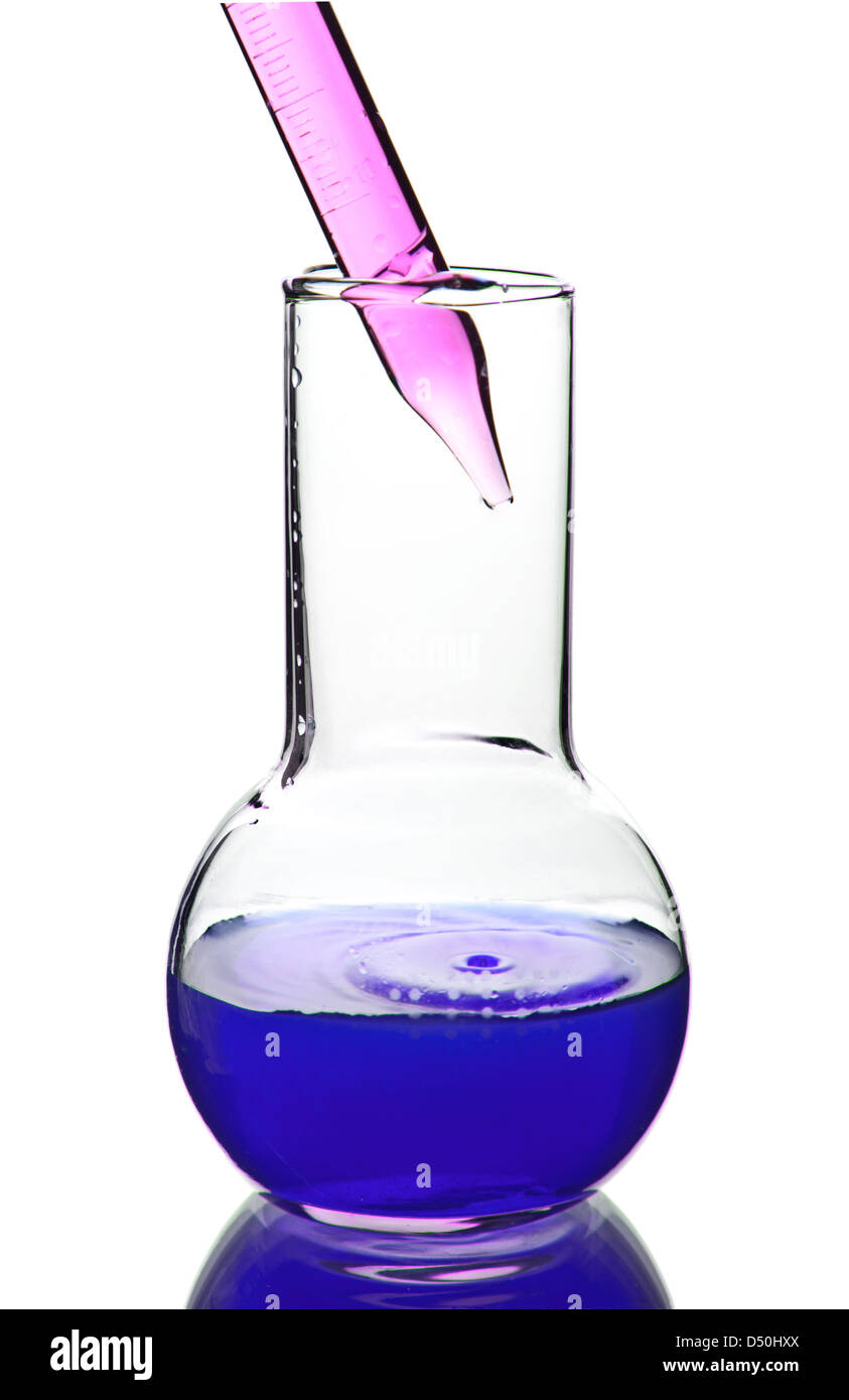 liquid dripping from pipette into flask isolated Stock Photo - Alamy