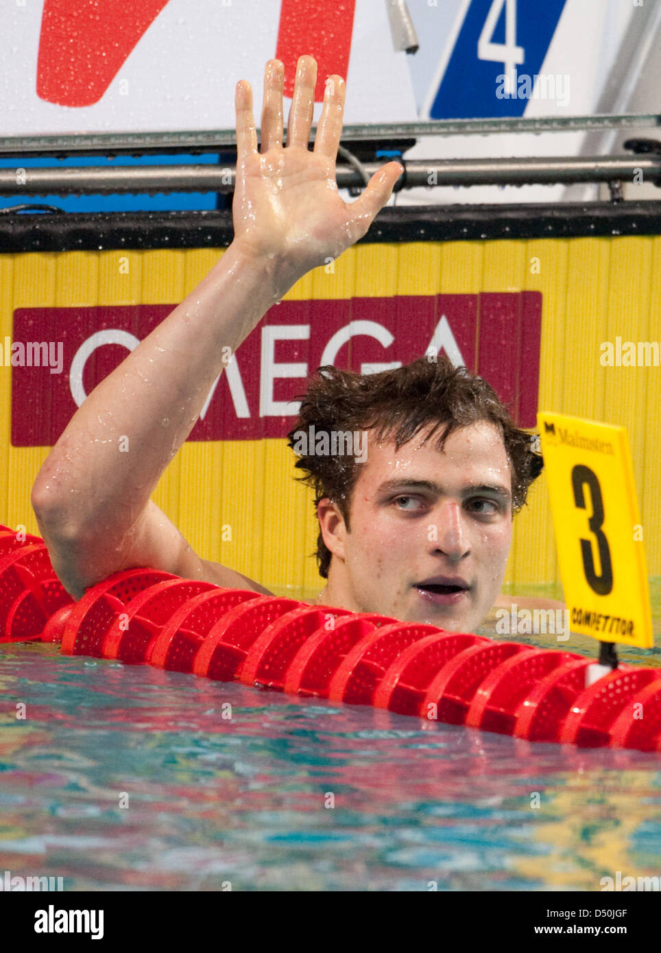 German swimmer Markus Deibler celebrates his victory in 100 metres ...