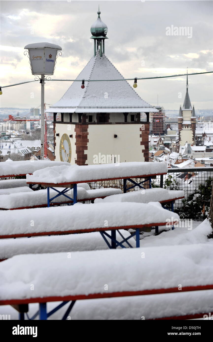 Snow covers tables and the landscape of Freiburg, Germany, 29 November ...