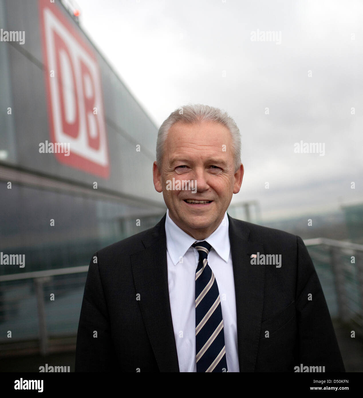 Deutsche Bahn CEO Ruediger Grube smiles on the roof of Deutsche Bahn ...