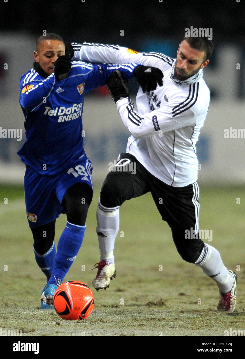 Leverkusen's Sidney Sam (L) and Trondheim's Rade Prica vie for the ball ...