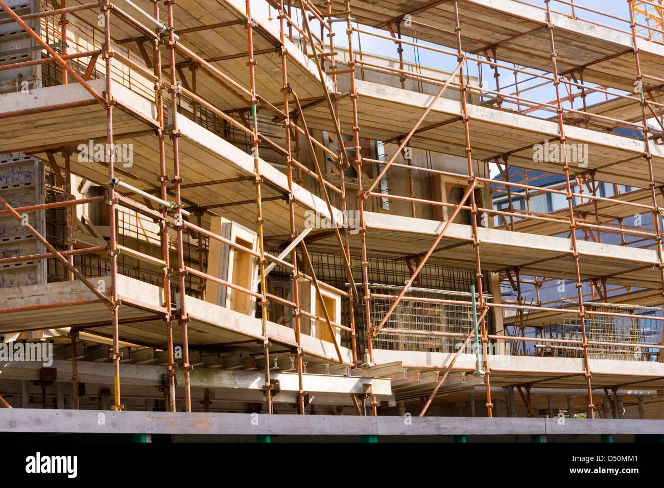 Levels of scaffolding around a new building Stock Photo - Alamy