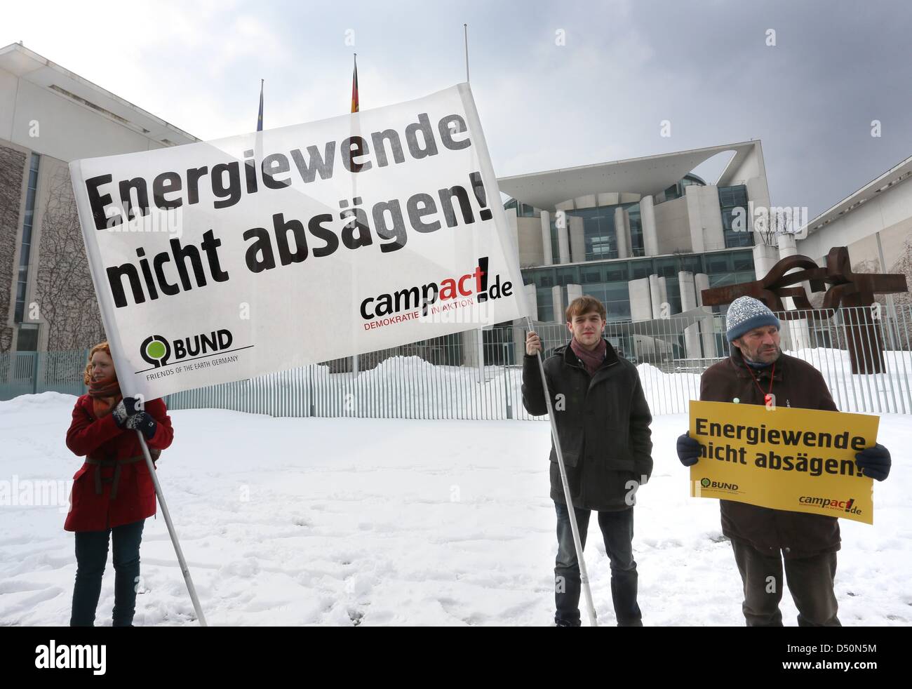 Berlin, Germany. 21st March 2013. Demonstrators protest with banners ...