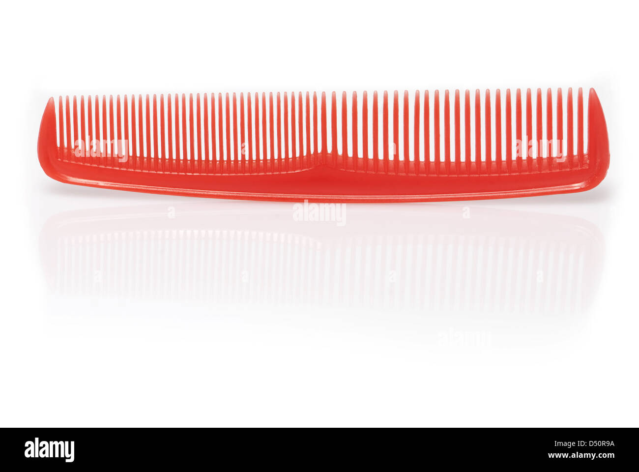 Plastic hair comb Cut Out Stock Images & Pictures - Alamy