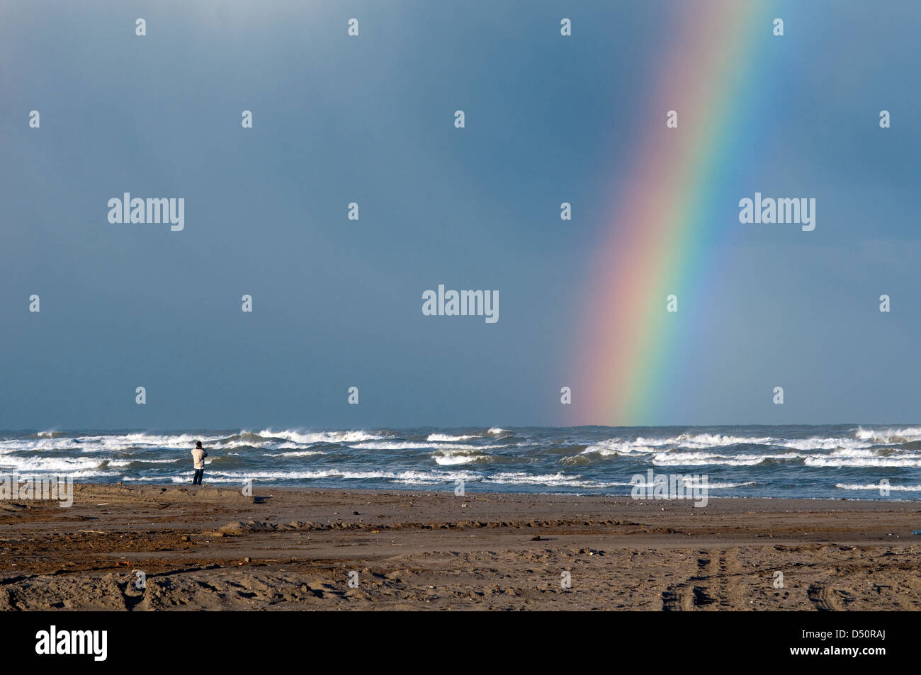 Italy, Emilia Romagna, Ravenna, Beach near Porto Corsini, Rainbow Stock ...
