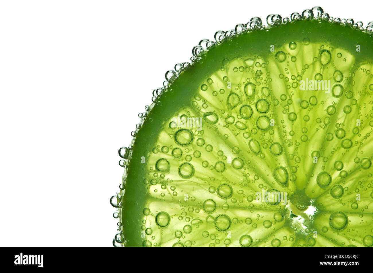 lime with bubbles isolated on white Stock Photo - Alamy