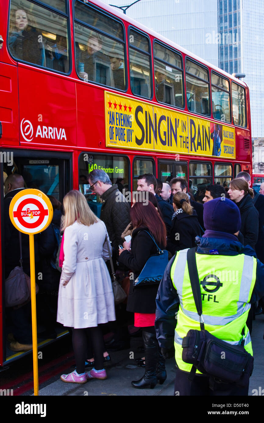 Boarding a bus on London bridge Stock Photo - Alamy