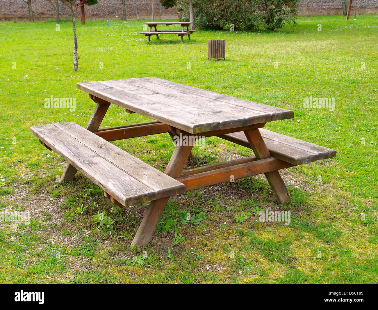 Table and benchs in a park. An outdoor scene Stock Photo - Alamy