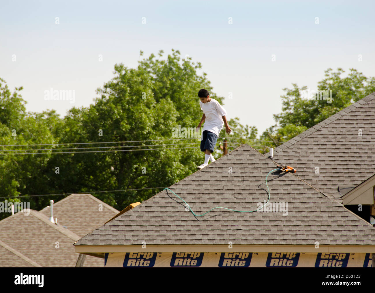 New home construction in Oklahoma City, Oklahoma, USA. A teenage ...