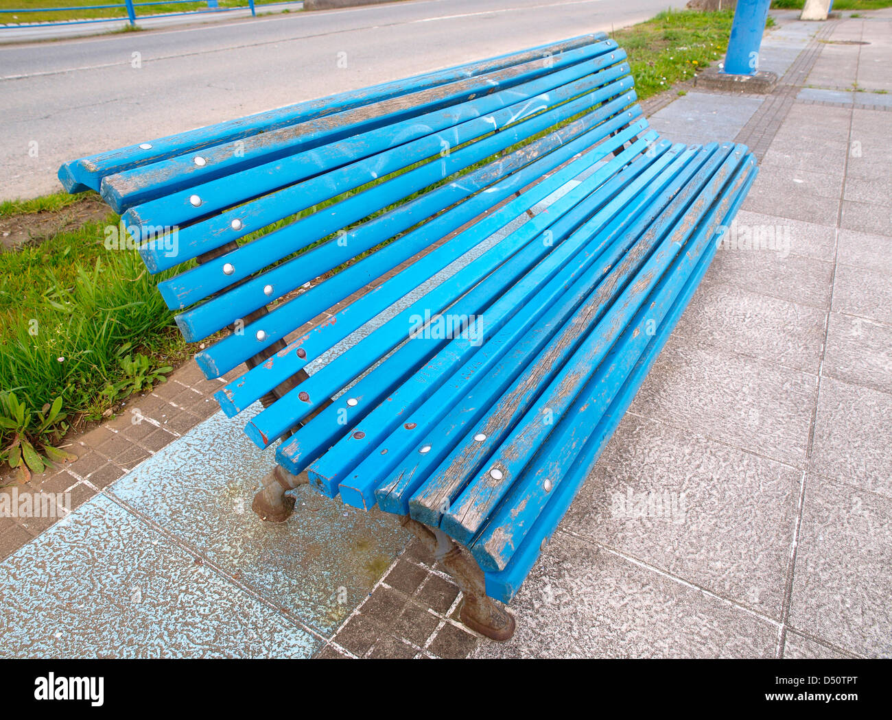 Wooden blue park bench. A good place to sit Stock Photo - Alamy