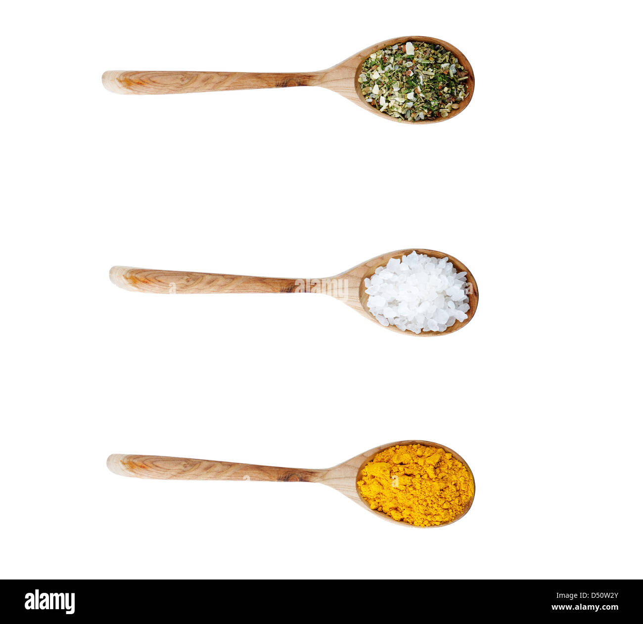 Three spoons with different spices isolated Stock Photo - Alamy