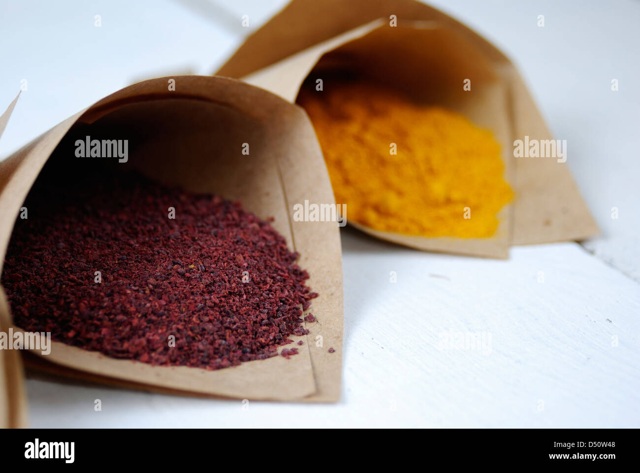 Paper envelopes with spices on the white oak table Stock Photo - Alamy