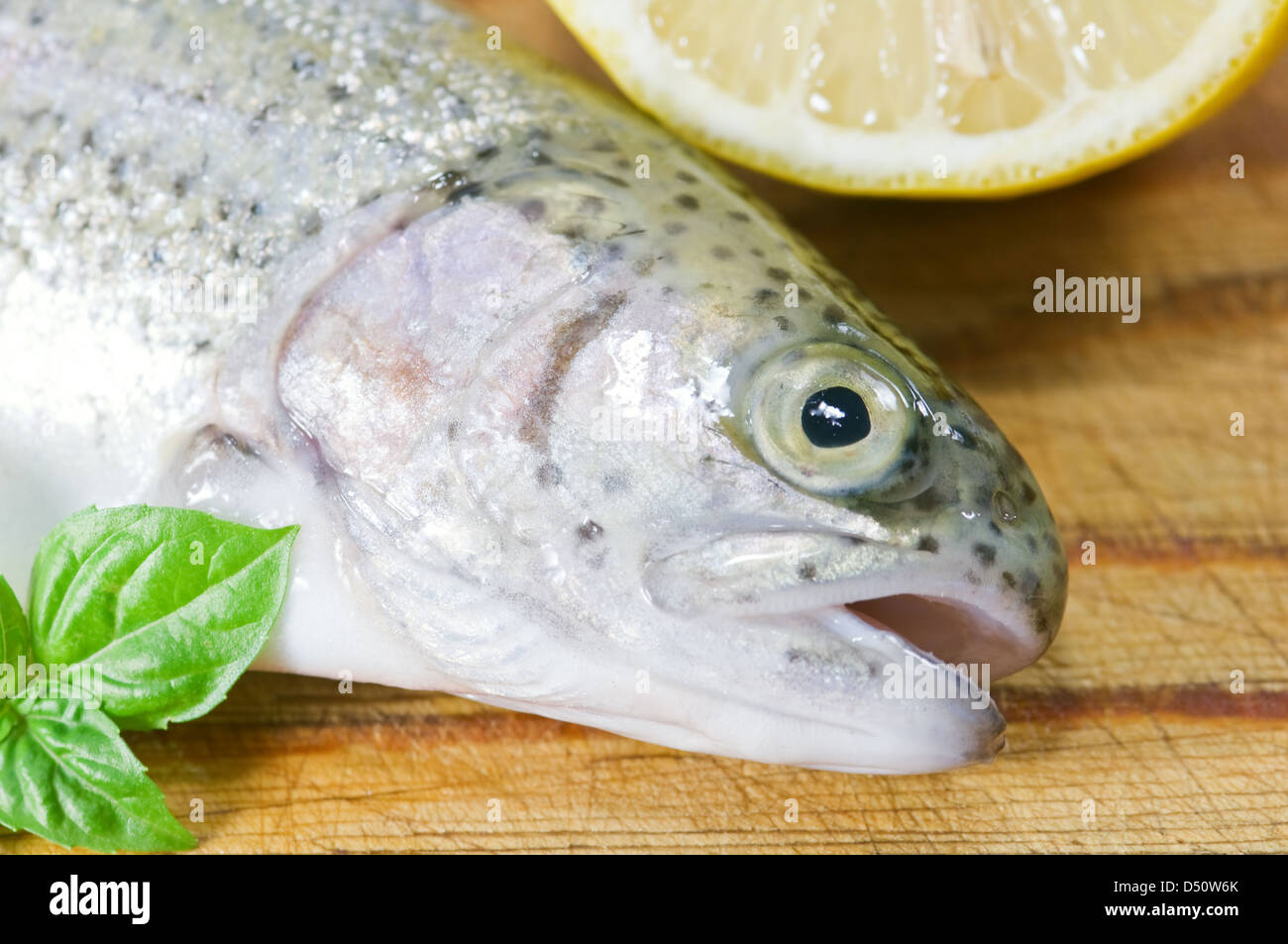 fresh trout on wood table Stock Photo - Alamy