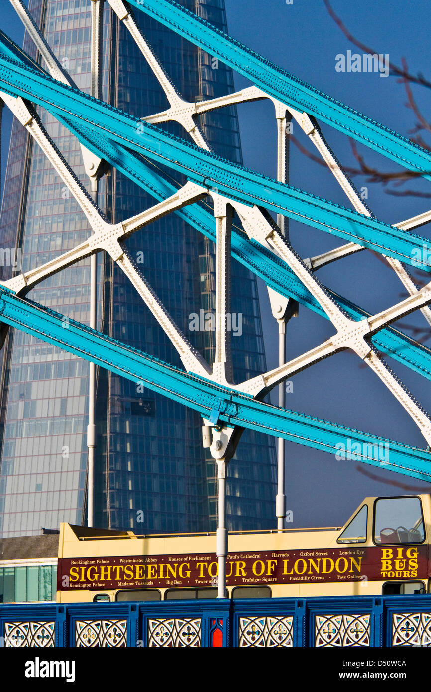 Sightseeing tour bus on Tower bridge & The Shard Stock Photo - Alamy