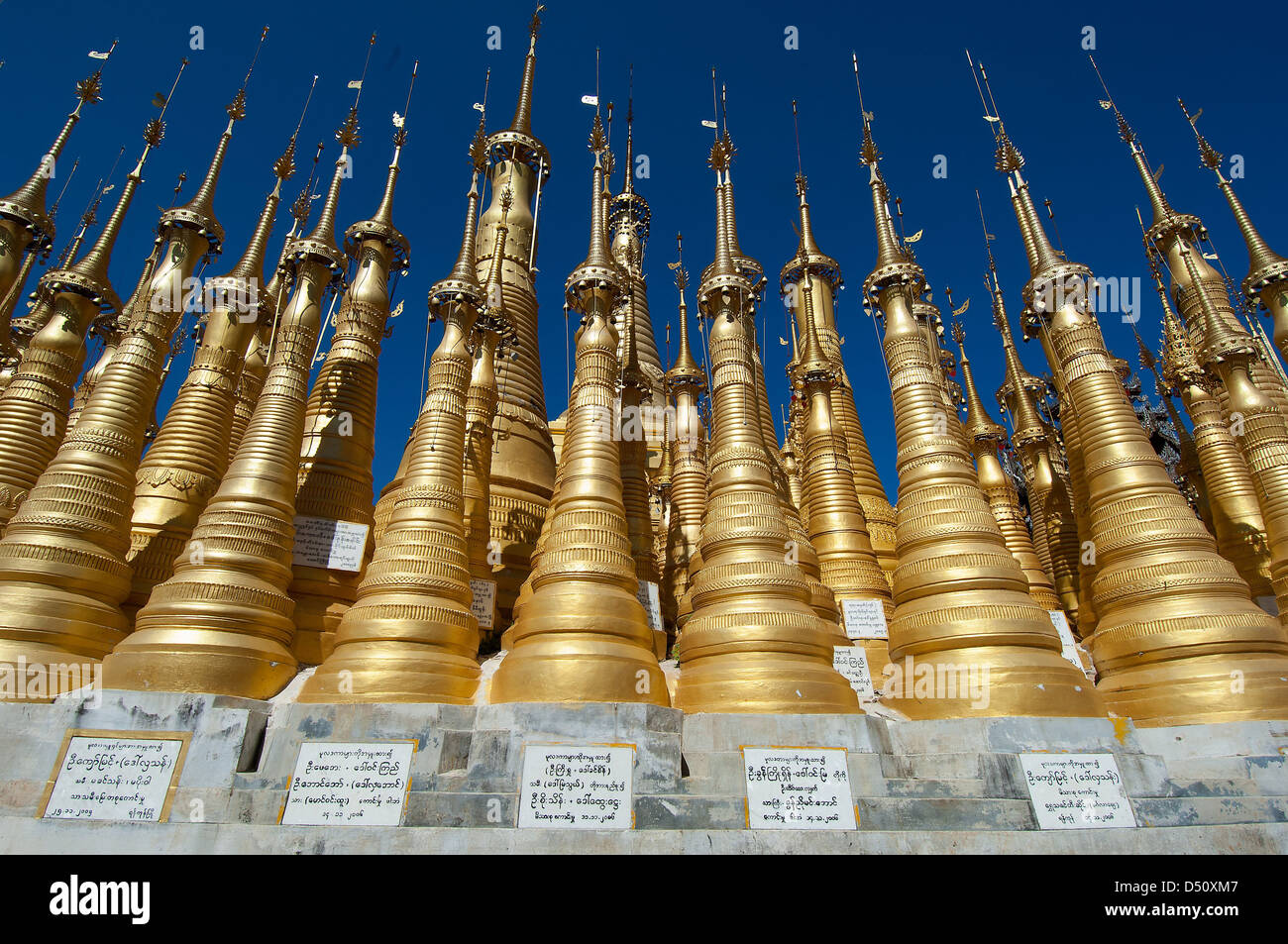 A forest of gleaming golden pagodas in the Shwe Inn Thein Pagoda near ...