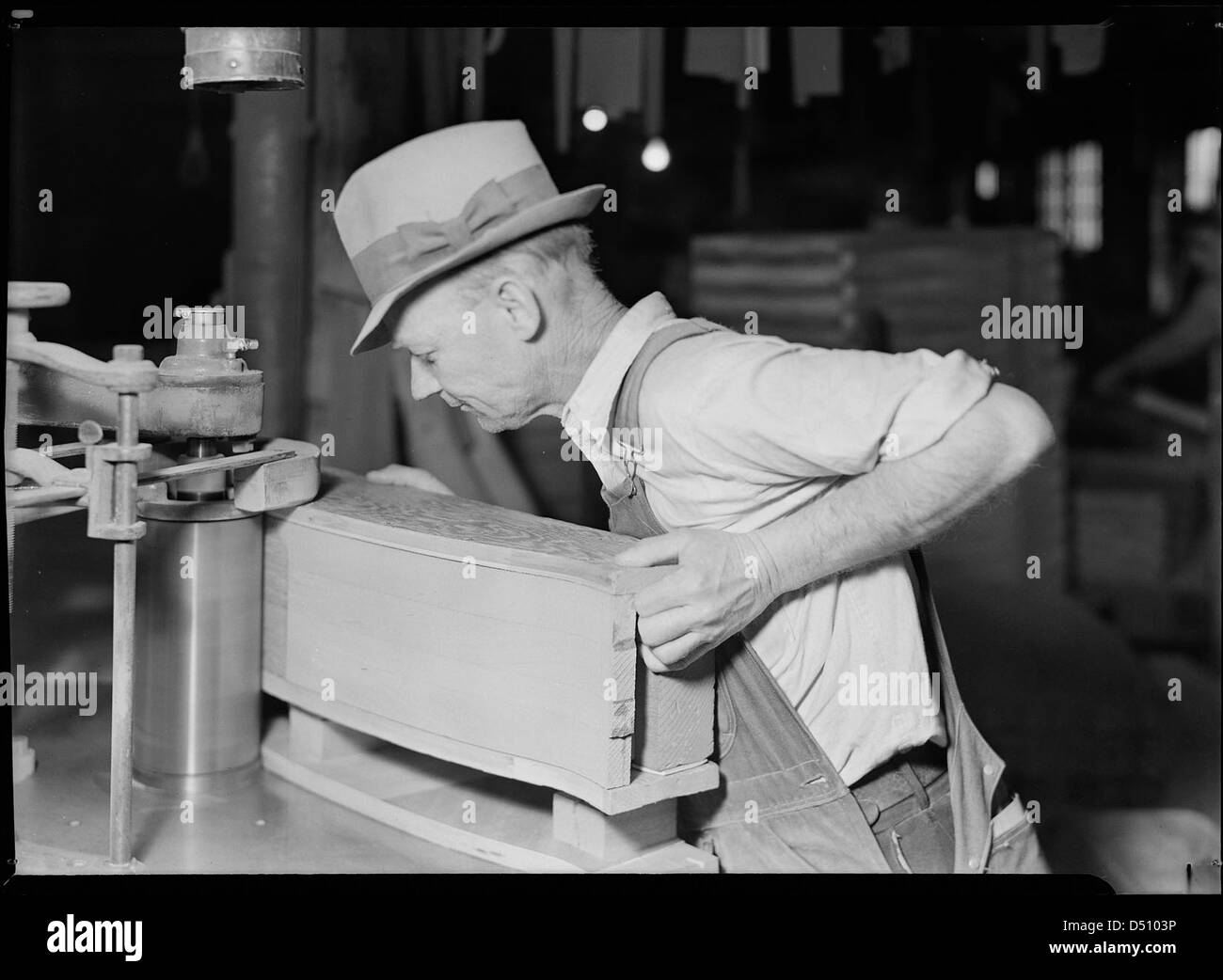 This 1936 photograph by Lewis Hine shows a machine and operator shaping ...