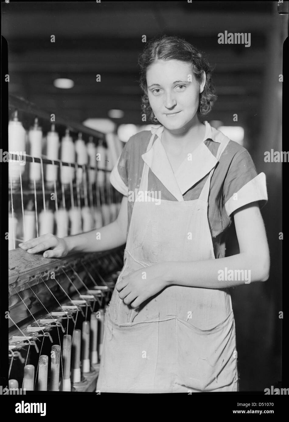 A photograph by Lewis Hine from January 1937 depicting a female spinner ...