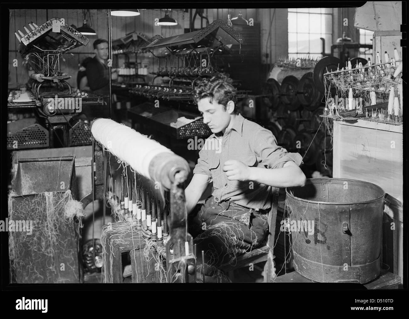 Textile worker Black and White Stock Photos & Images - Alamy
