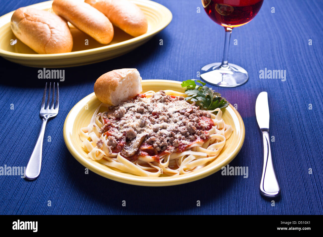 Pasta and gravy table setting Stock Photo - Alamy