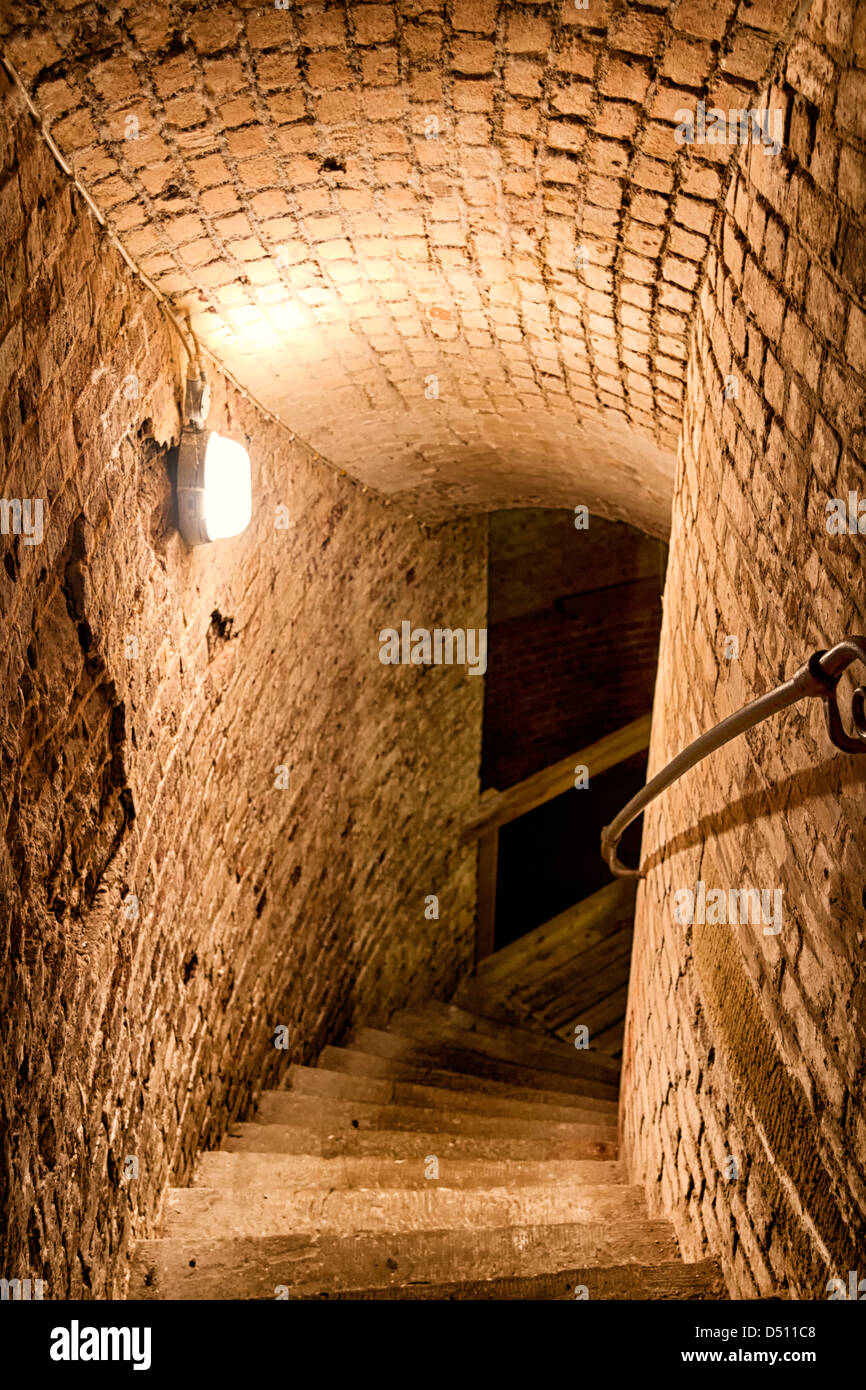 Walled steps leading down to a cellar Stock Photo - Alamy