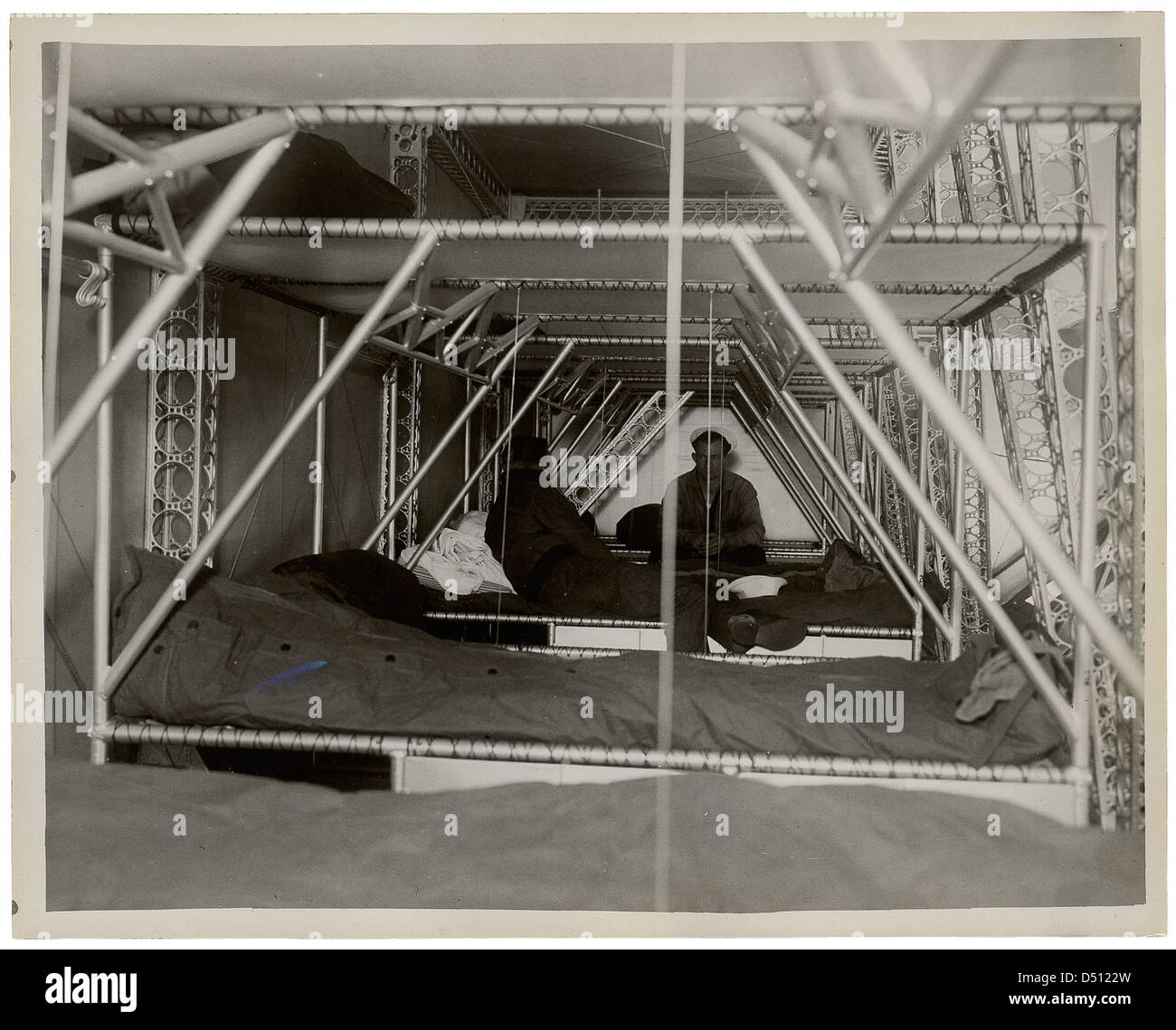 A circa 1933 photograph shows the crew bunks inside a dirigible, such ...