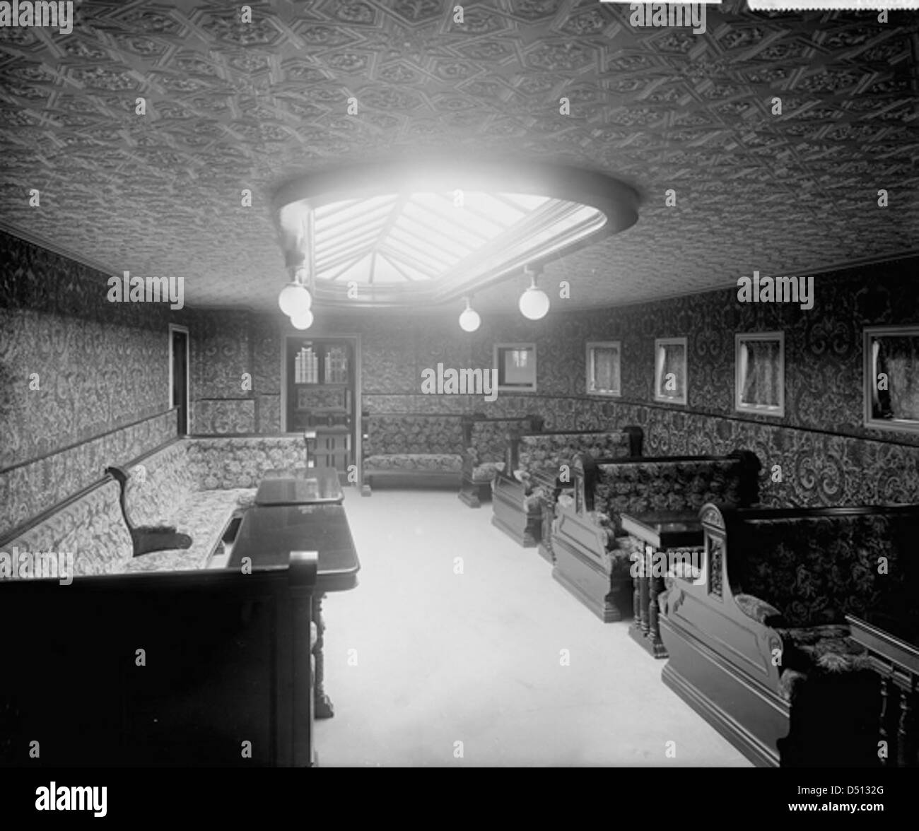 The first-class smoking room aboard the ship 'Australia' is captured in ...
