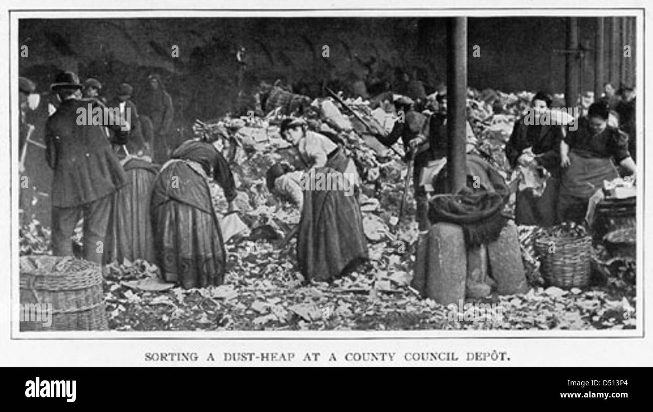 A photograph depicting workers sorting through a dust heap, captured by ...