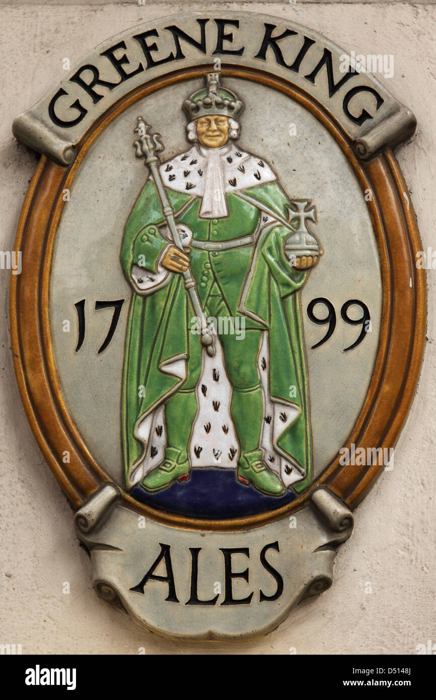Ceramic sign for the Greene King brewery on the wall of a pub in London ...