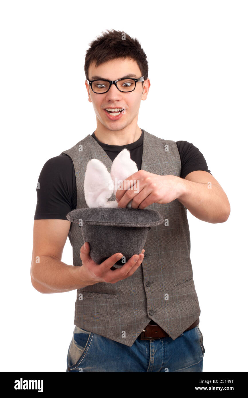 Portrait of young man doing magic Stock Photo - Alamy