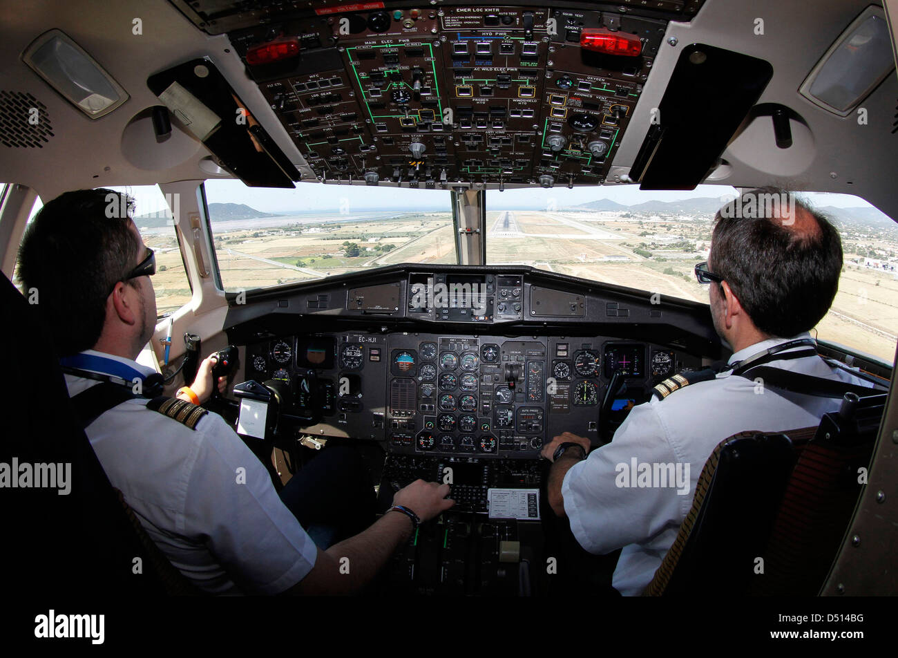View from a passengers jet cockpit during the approach to Ibiza airport ...