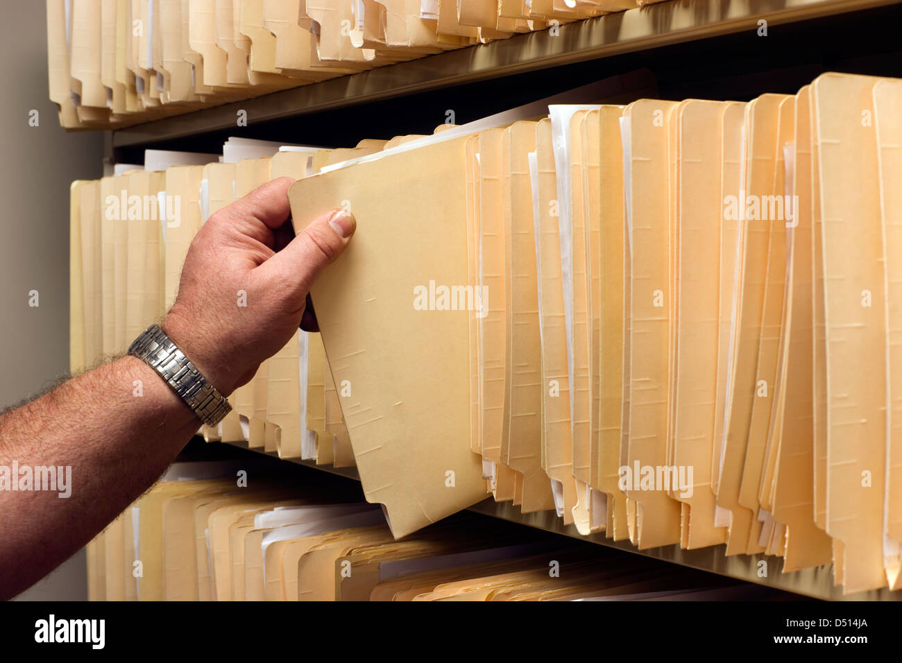 Hand and files hi-res stock photography and images - Alamy