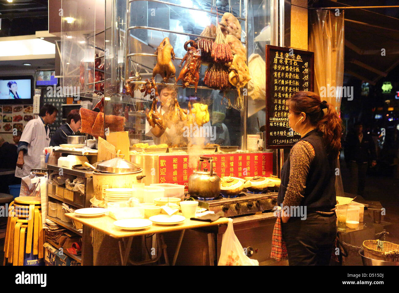 Hong Kong, China, street snacks at night Stock Photo - Alamy