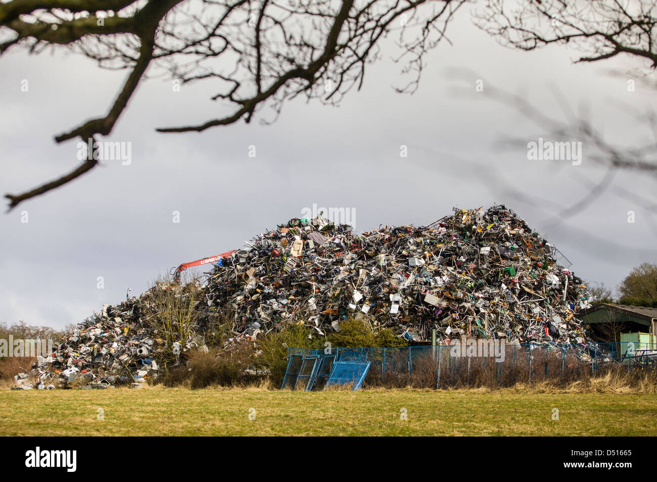A pile of scrap towers high close to the village of Beoley ...