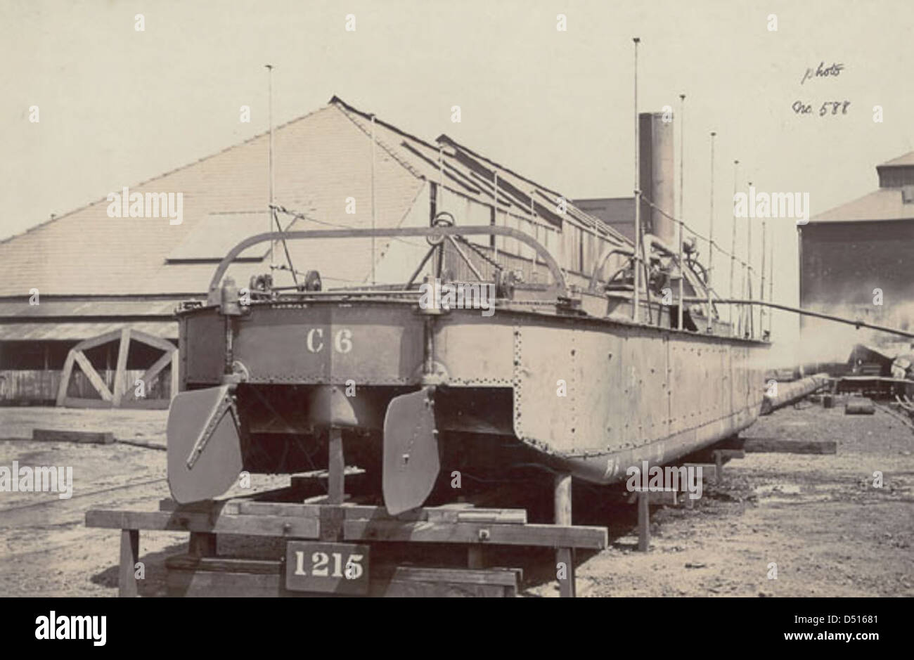 At Yarrow's Yard, a small vessel is under construction, captured in a ...